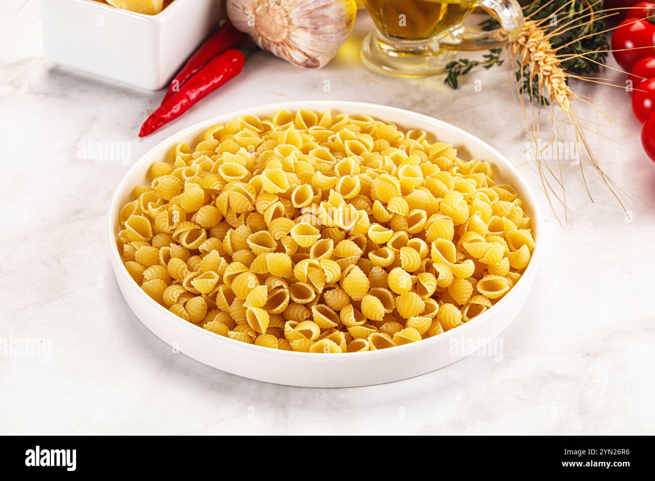 Italian cuisine - dry conchiglie shell pasta Stock Photo - Alamy
