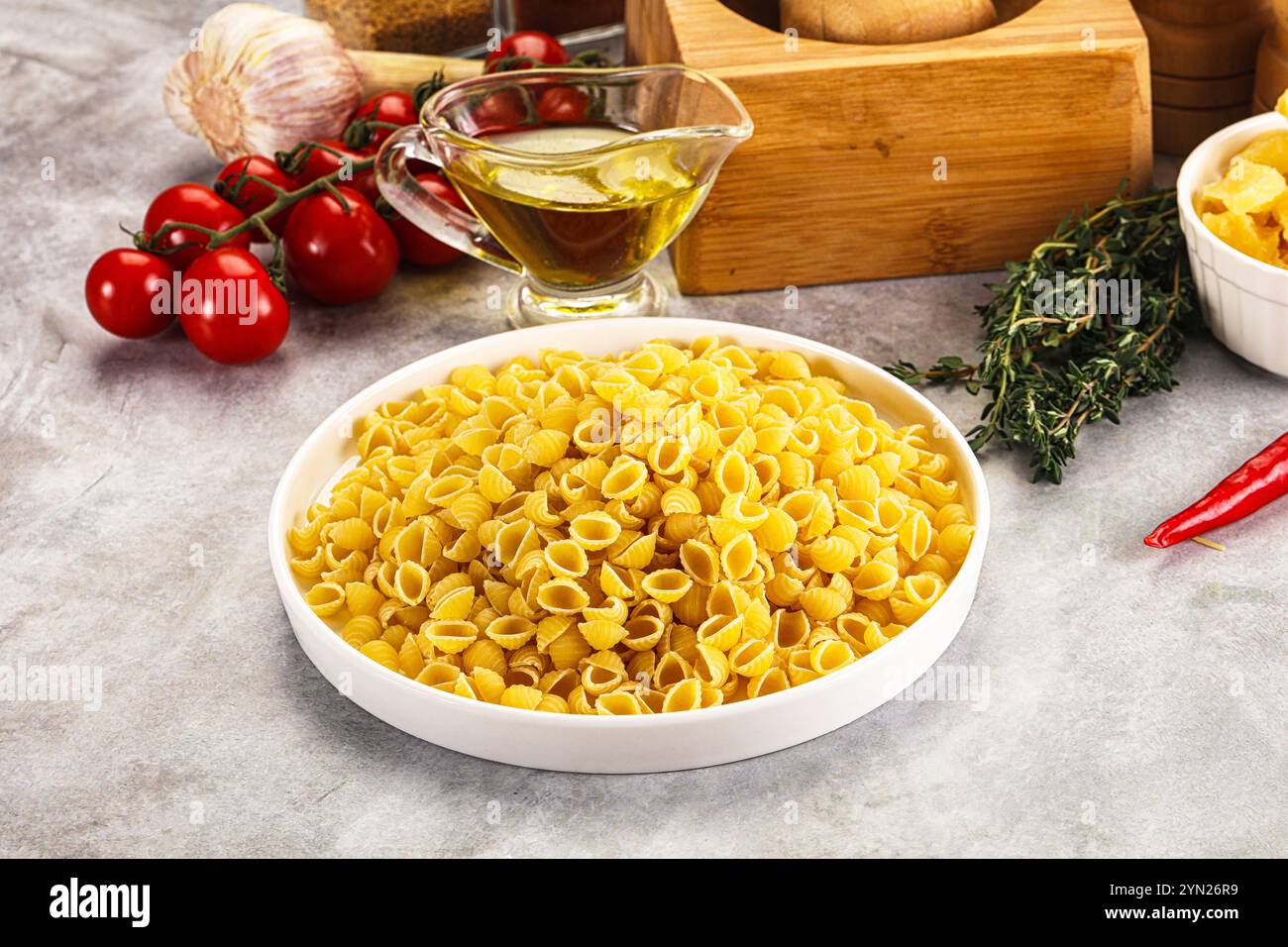 Italian cuisine - dry conchiglie shell pasta Stock Photo - Alamy