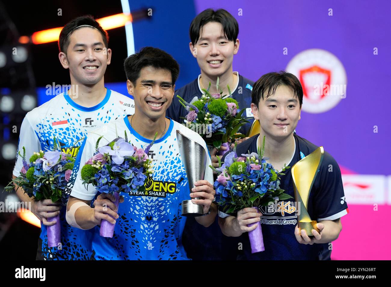 Jin Yong and Seo Sung Jae of South Korea, right, pose with their ...