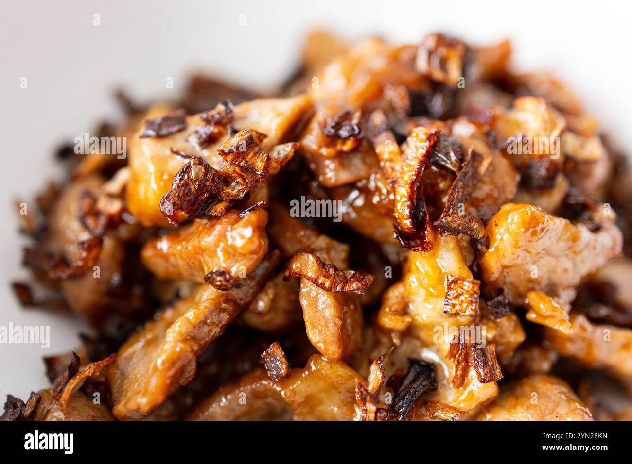 Caramelized pork with crispy shallots Stock Photo - Alamy