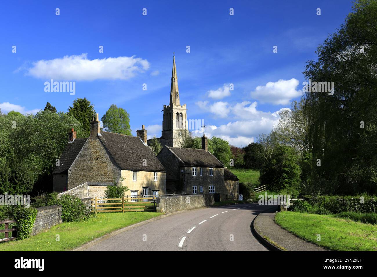Summer view of St Nicholas church, Bulwick village, Northamptonshire ...