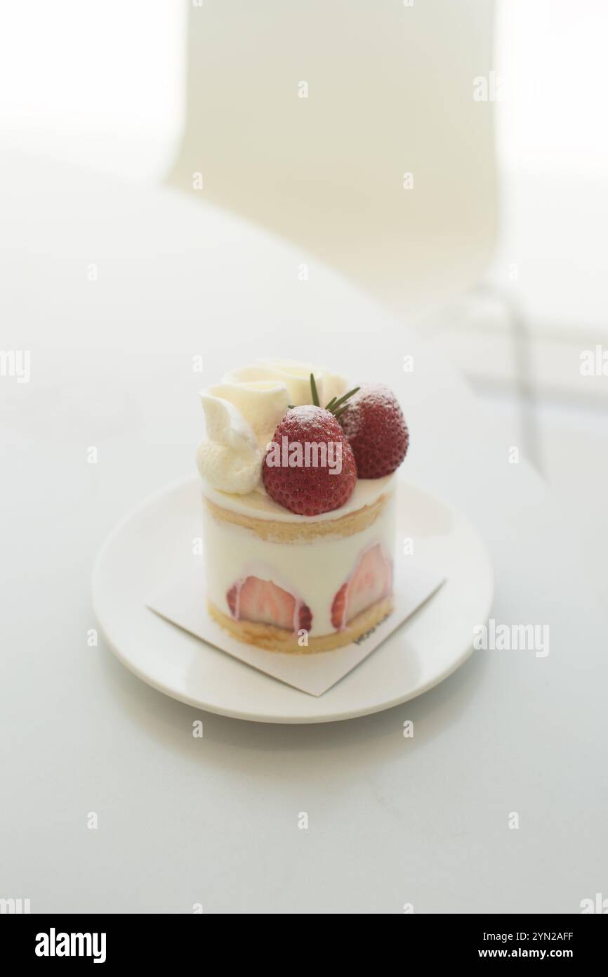 A delectable strawberry shortcake topped with fresh strawberries and ...