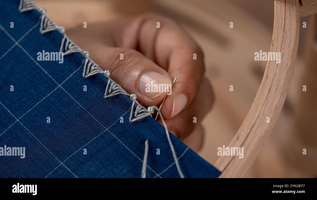 Stitching hand needle hi-res stock photography and images - Alamy