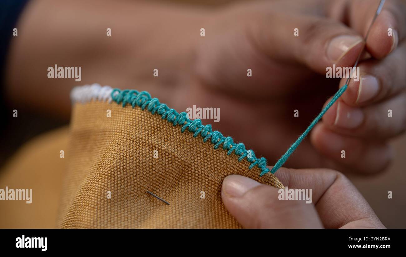 Textile artist hand stitching hi-res stock photography and images - Alamy