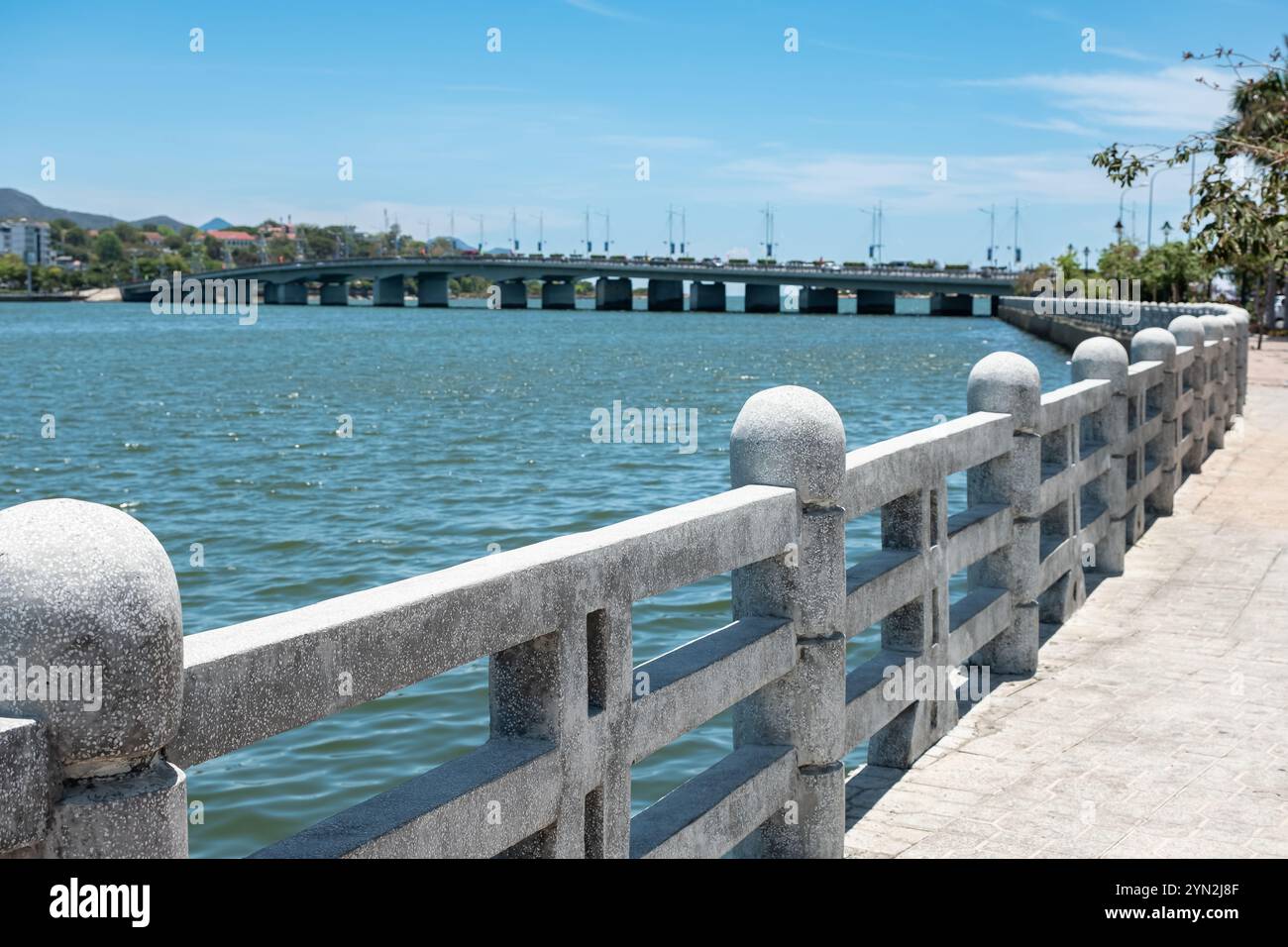 Beautiful beach walkway by seaside in a sunny summer day. Concrete ...