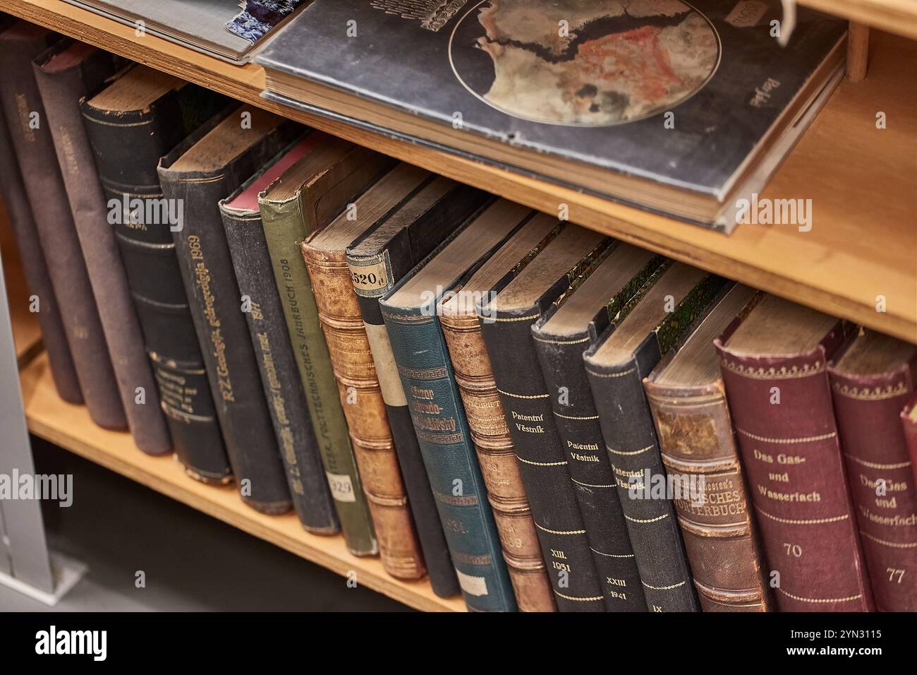 Old books in a library Stock Photo - Alamy
