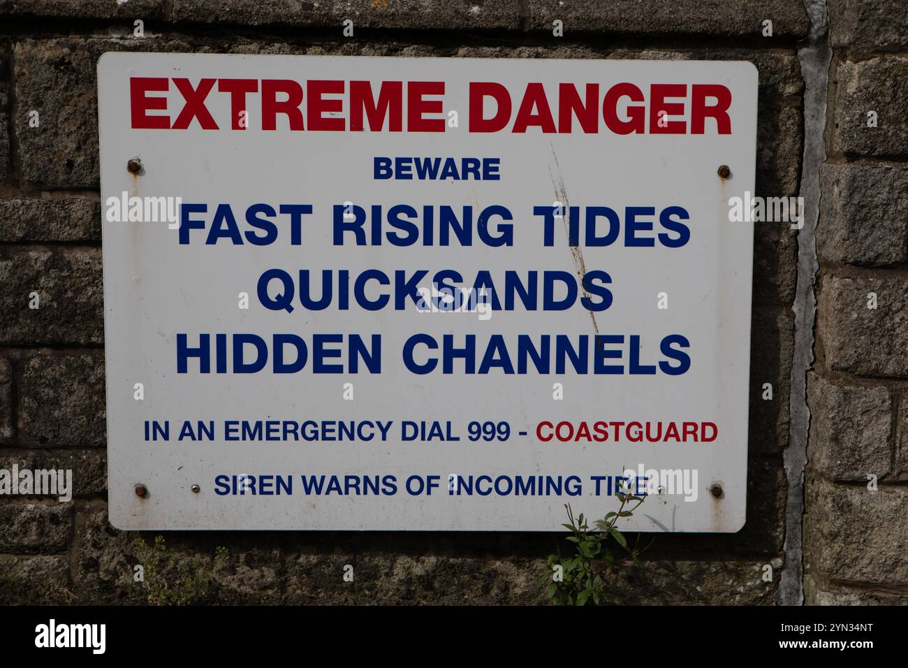 Sign warning of fast tides and quicksand, Morecambe Bay Stock Photo - Alamy