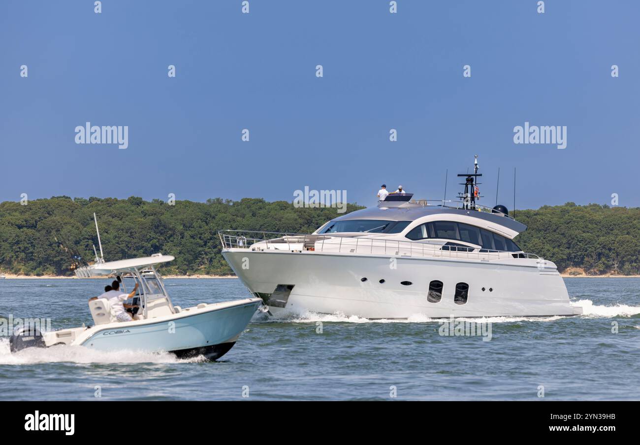 two expensive boats passing each other off shelter island, ny Stock ...