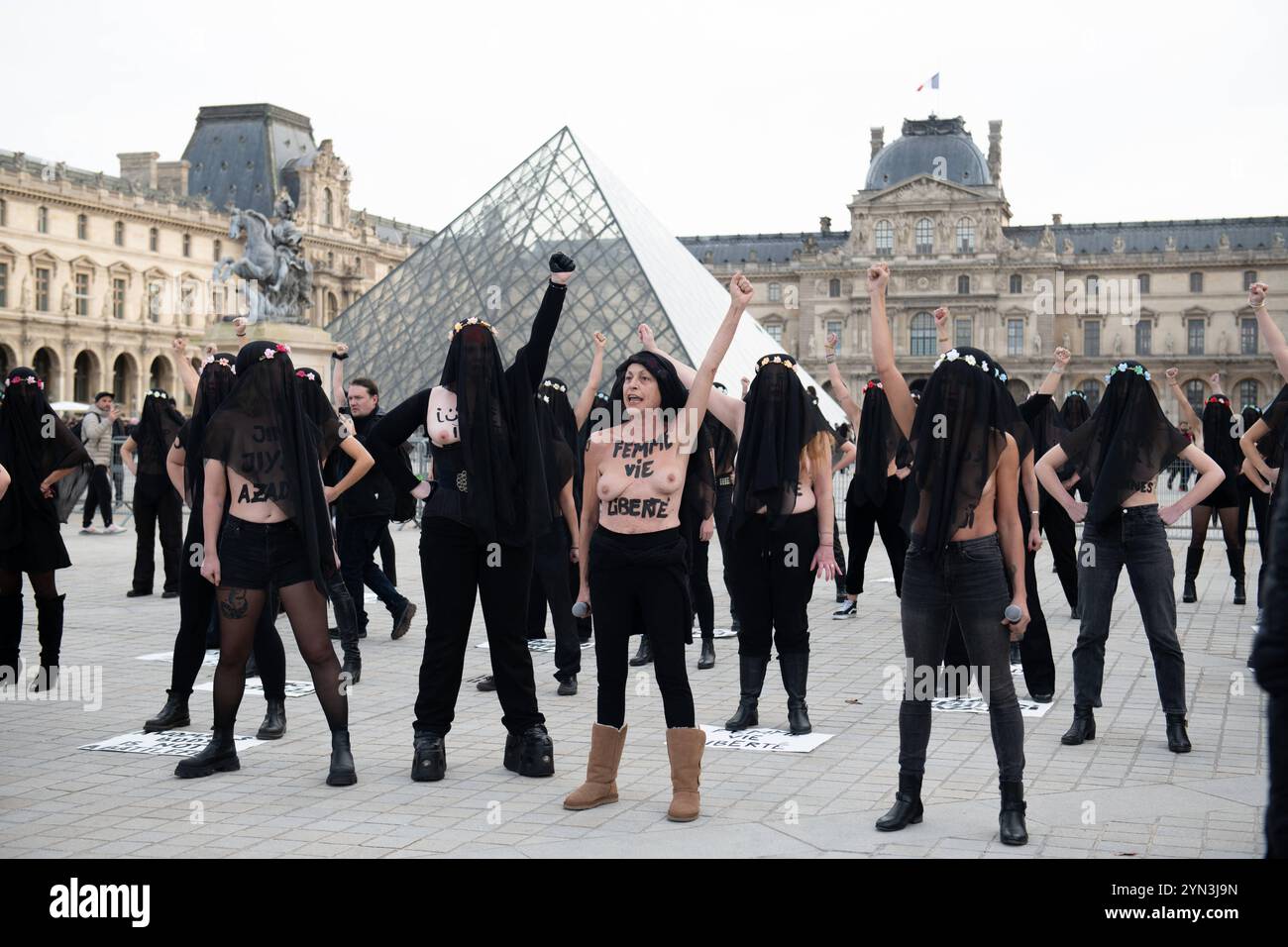 Paris, France. 24th Nov, 2024. Singer Lio during a FEMEN rally to ...