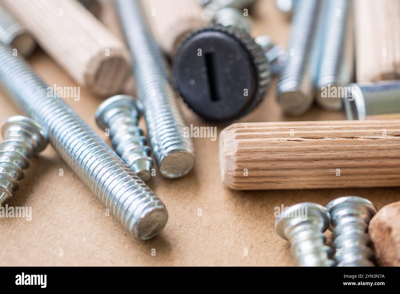 Assembly furniture tool kit with screw dowel and bolt Stock Photo - Alamy