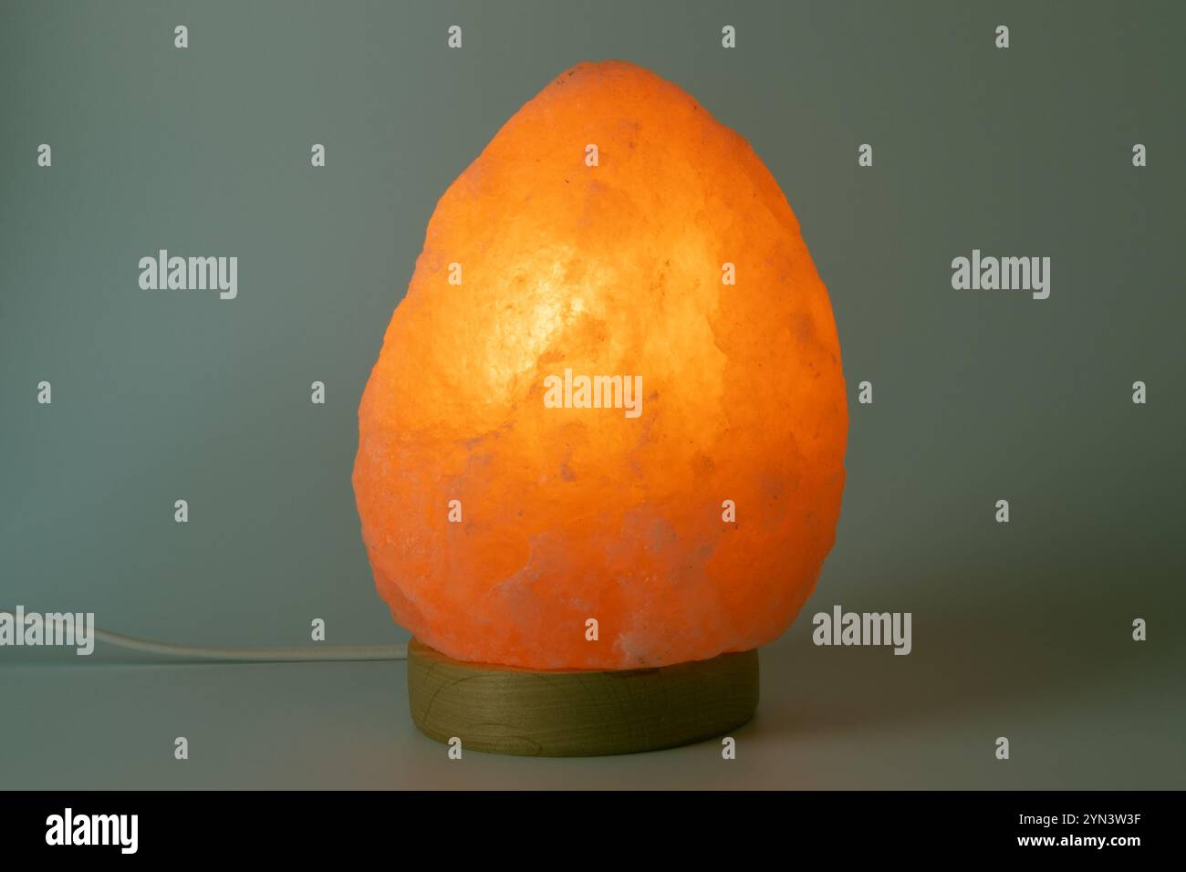 Pink salt lamp glowing, close-up Stock Photo - Alamy