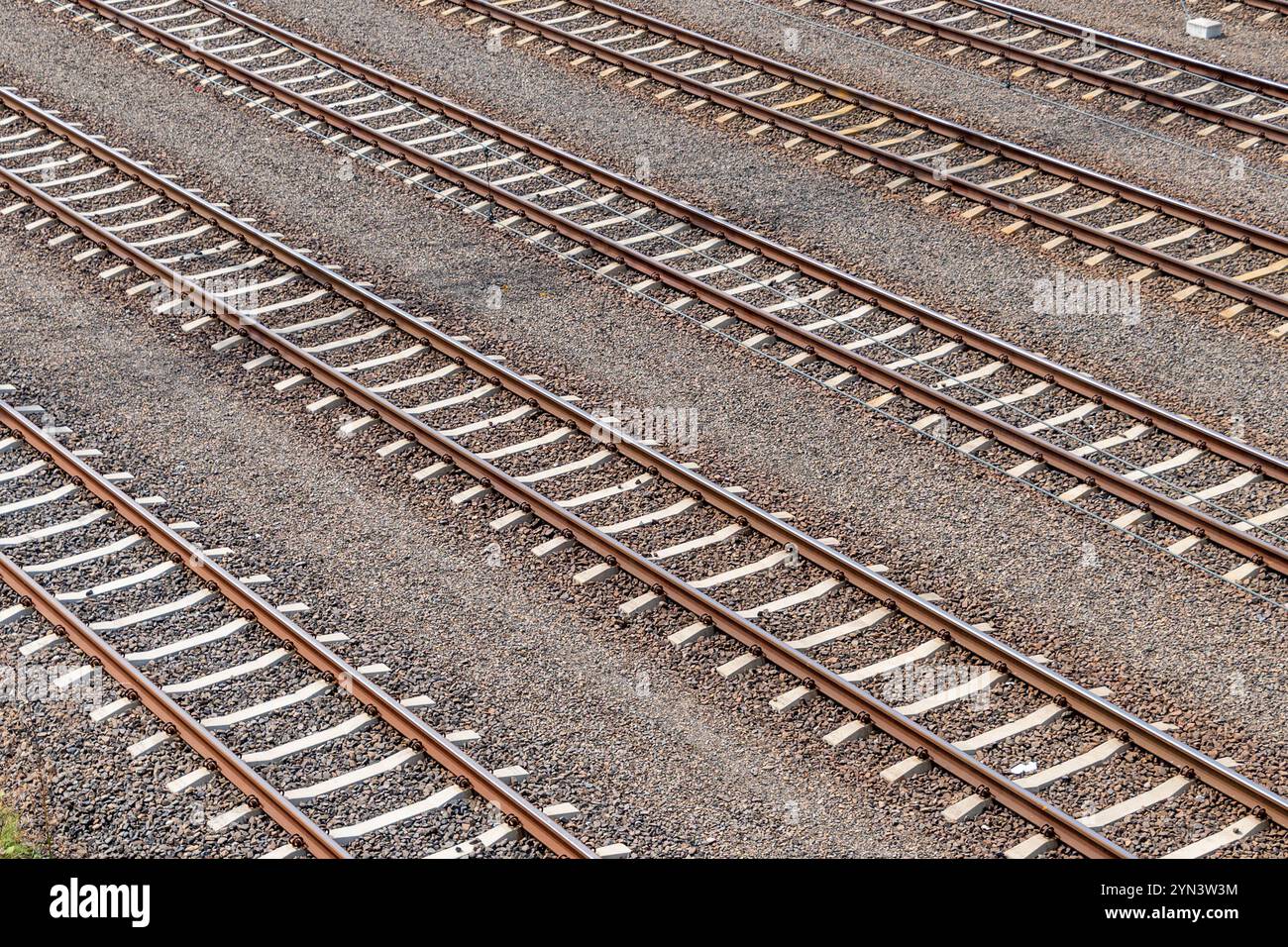 A railway yard with multiple parallel train tracks. Transport, industry Stock Photo - Alamy