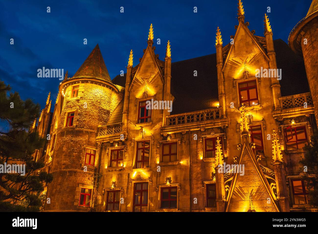walls of the old medieval castle house illuminated at night Stock Photo ...
