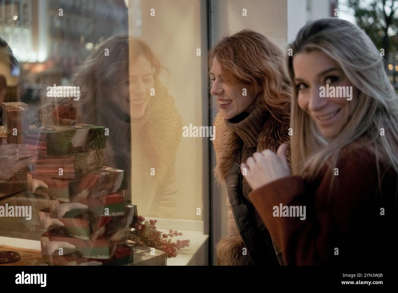 women friends window shopping at Christmas Stock Photo - Alamy