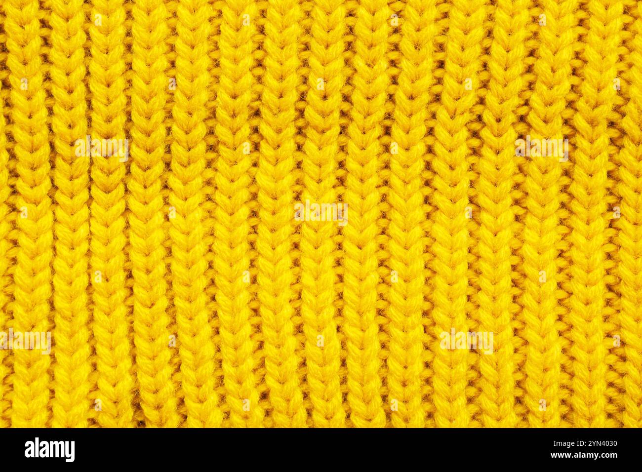 Yellow knitting wool texture background Stock Photo - Alamy