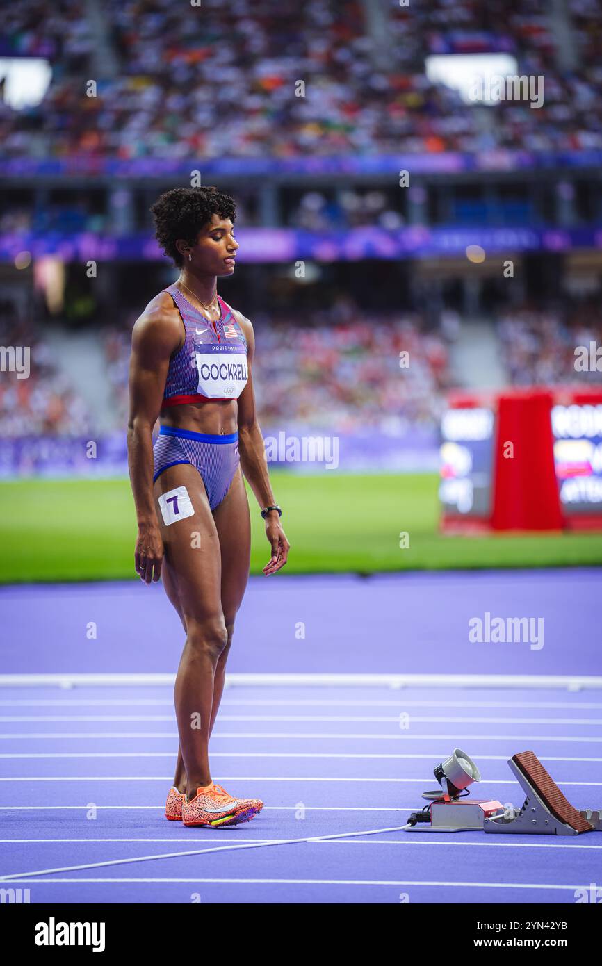 Anna Cockrell participating in the 400 meters hurdles at the Paris 2024 ...