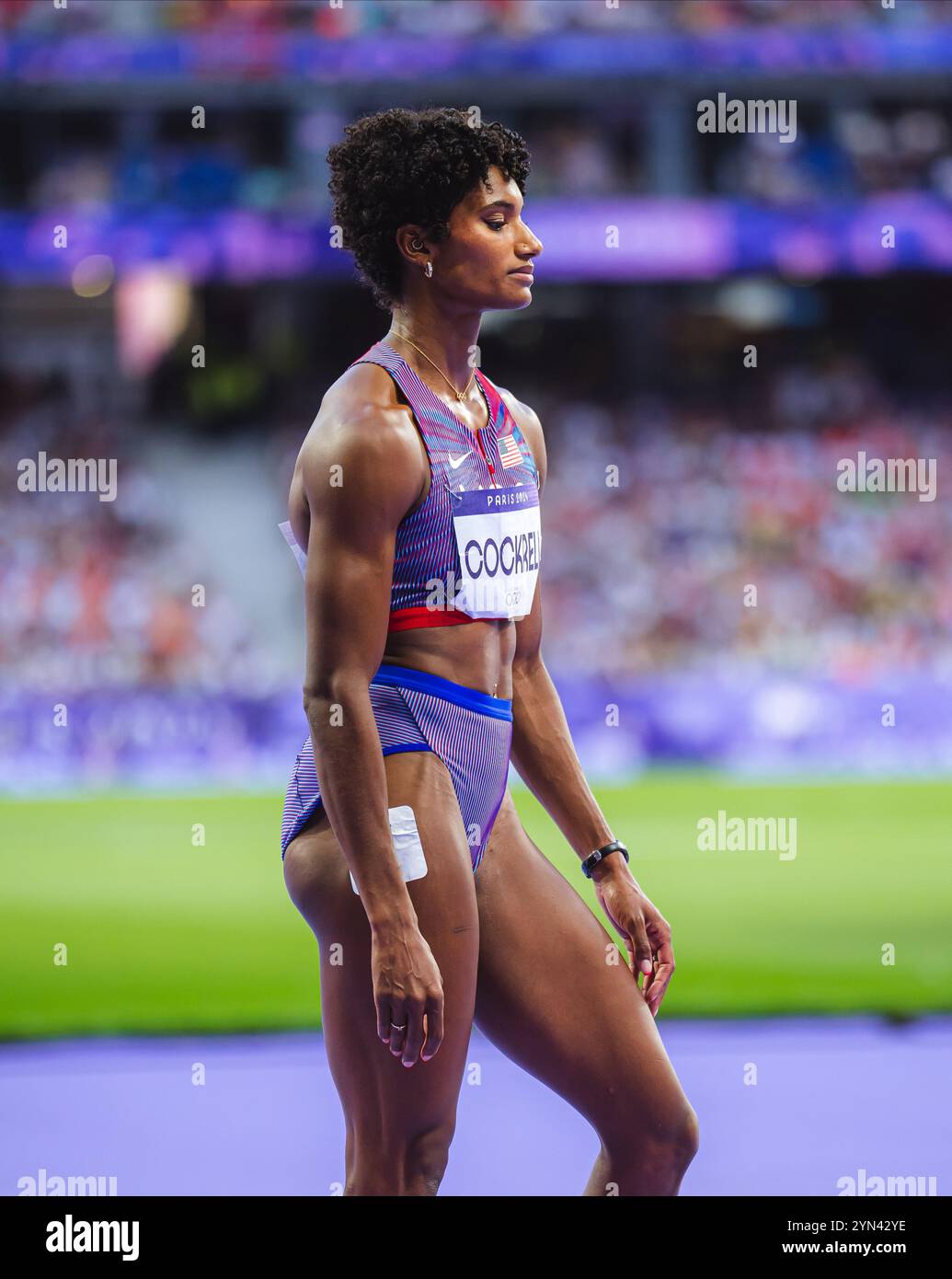 Anna Cockrell participating in the 400 meters hurdles at the Paris 2024 ...
