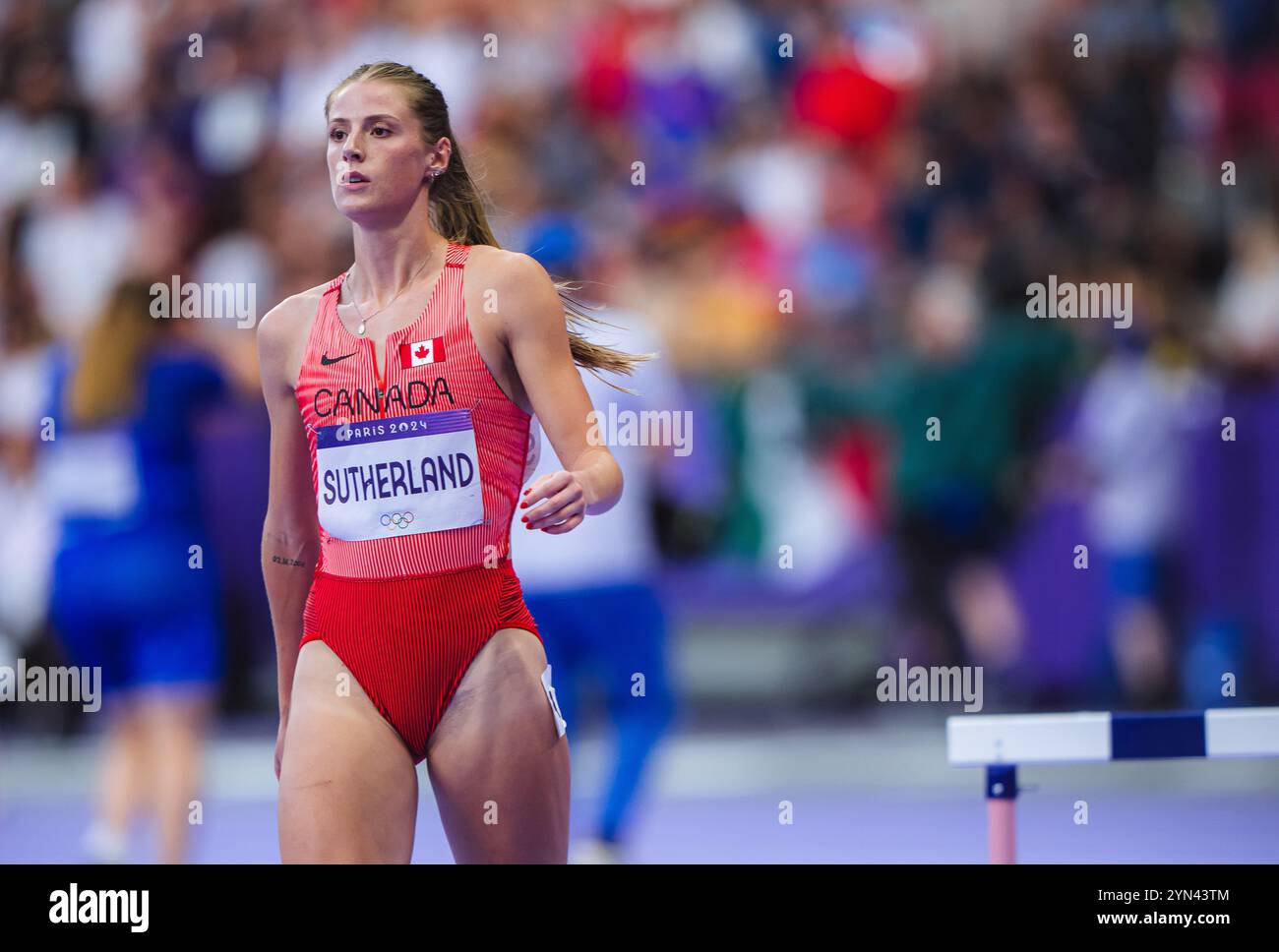 Savannah Sutherland participating in the 400 meters hurdles at the ...