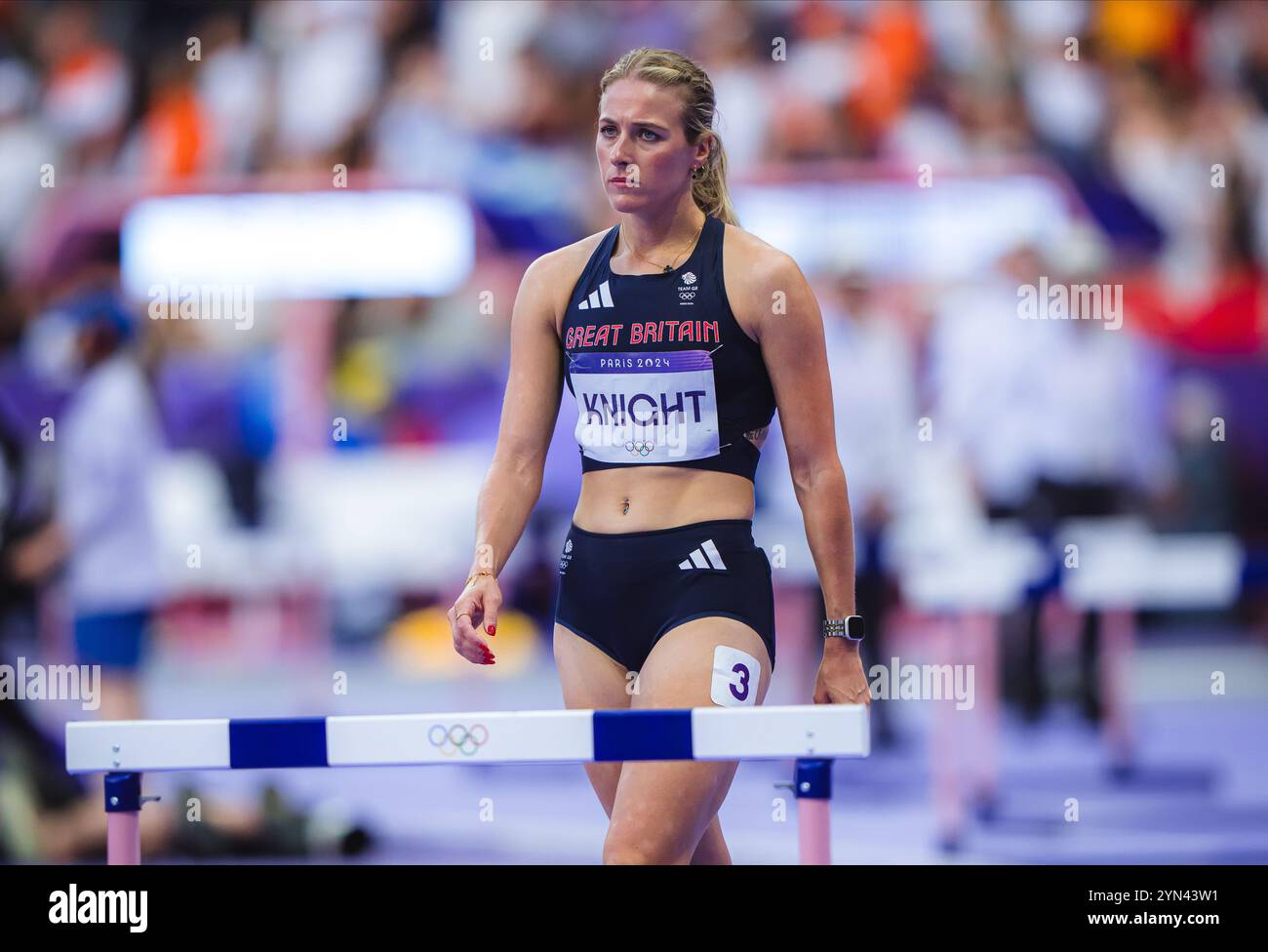 Jessie Knight participating in the 400 meters hurdles at the Paris 2024 ...