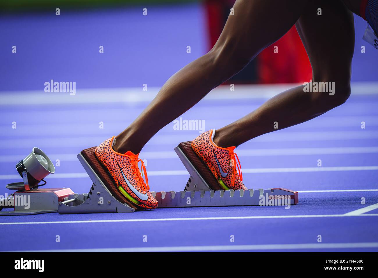 Anna Cockrell participating in the 400 meters hurdles at the Paris 2024 ...