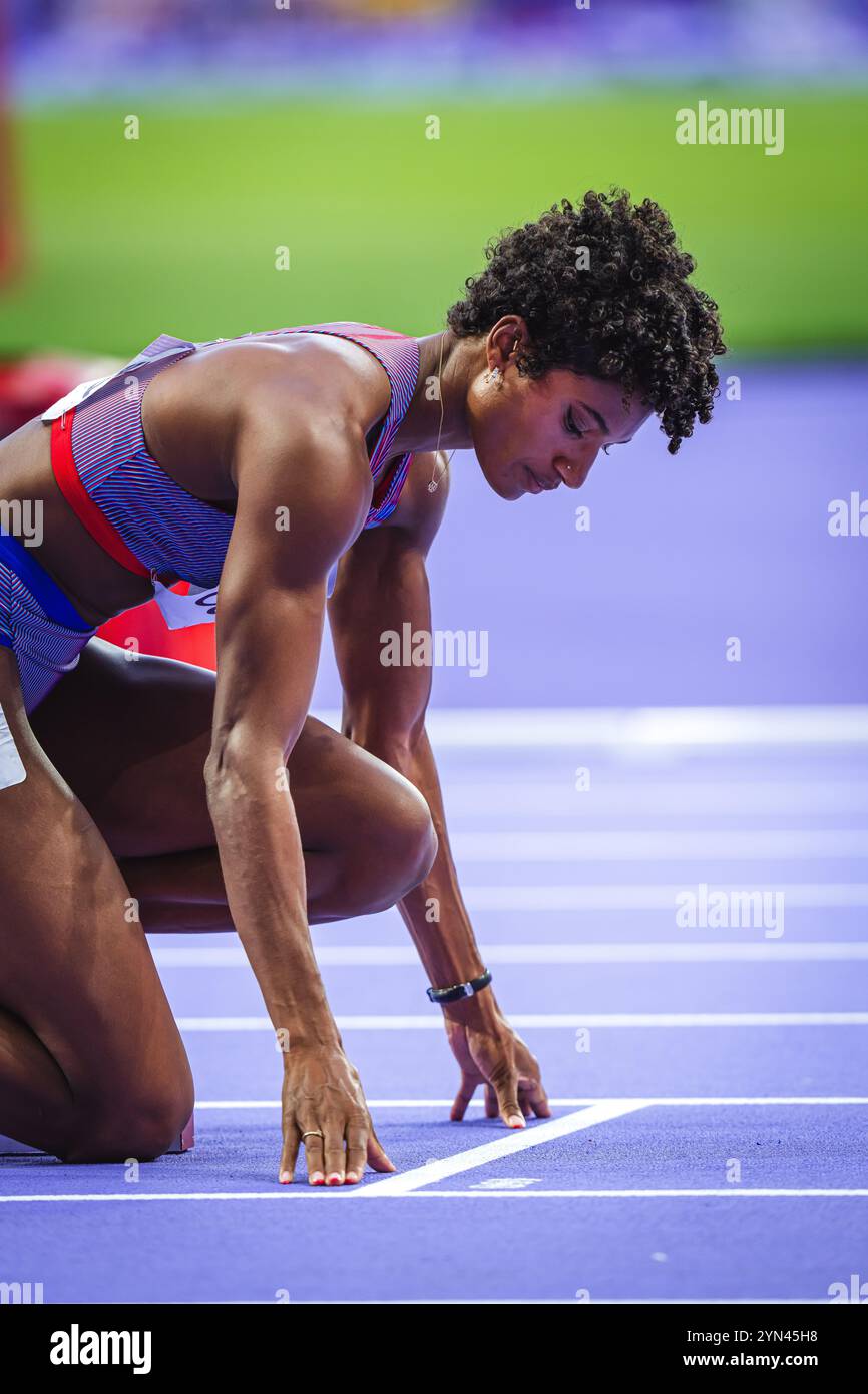 Anna Cockrell participating in the 400 meters hurdles at the Paris 2024 ...