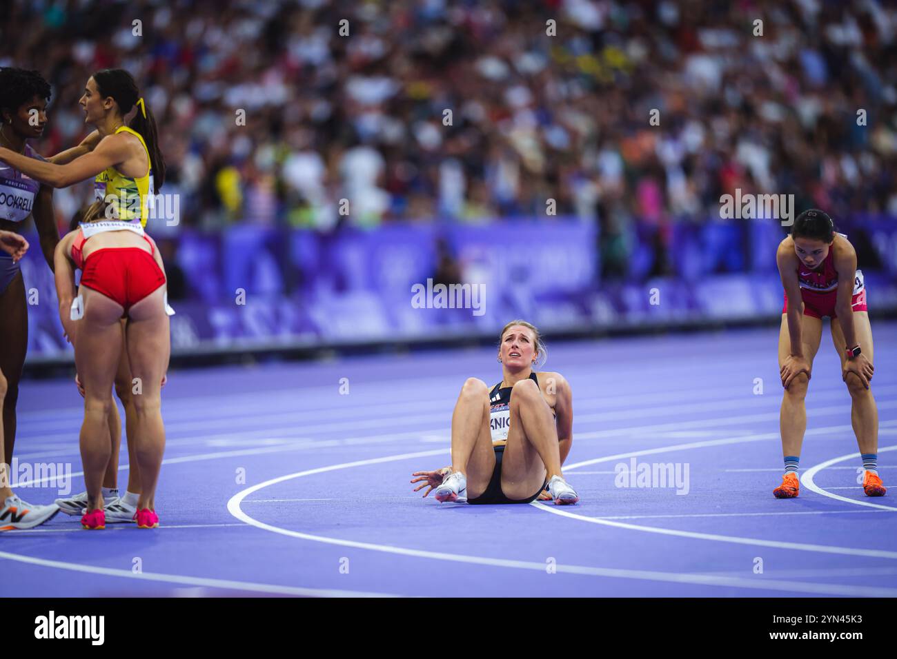 Jessie Knight participating in the 400 meters hurdles at the Paris 2024 ...