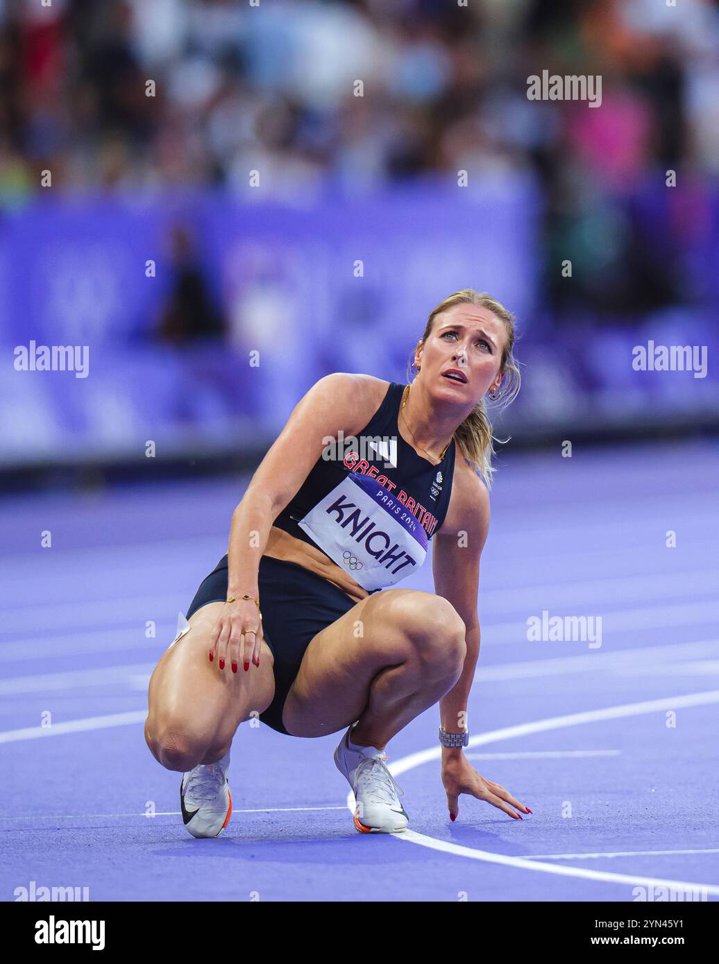 Jessie Knight participating in the 400 meters hurdles at the Paris 2024 ...