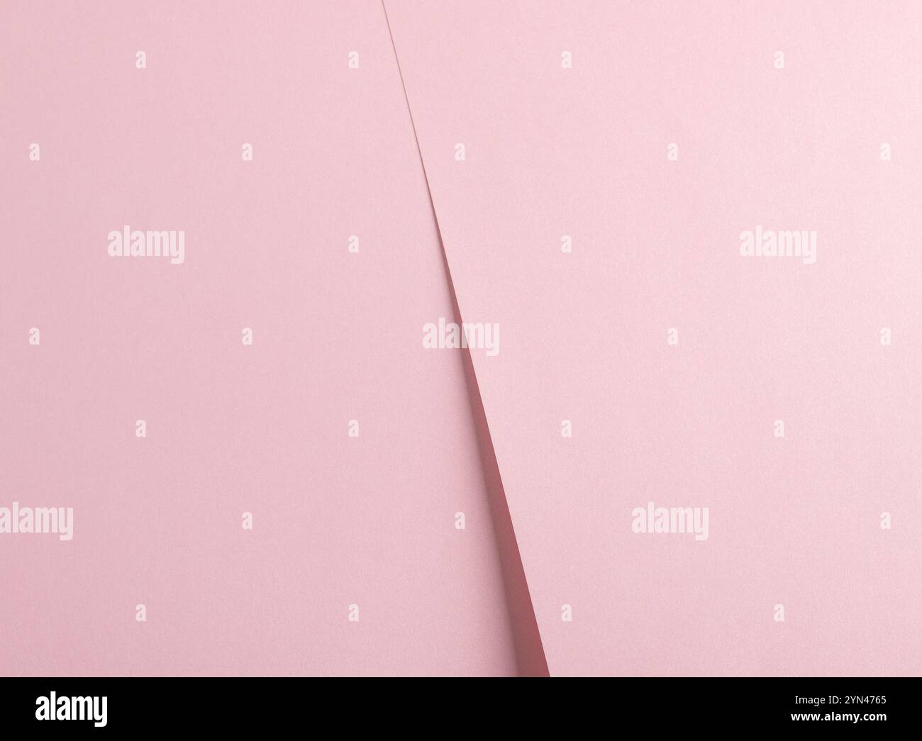 Pink split paper background with a soft matte texture and subtle ...
