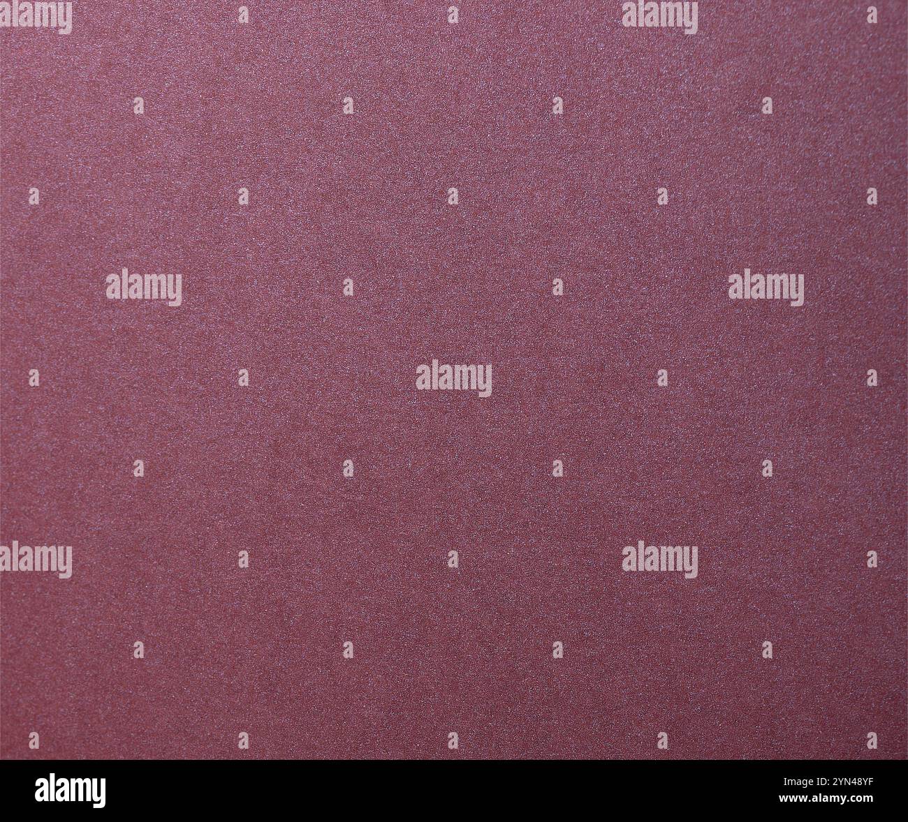 Metallic burgundy paper background with a smooth, shimmering surface ...