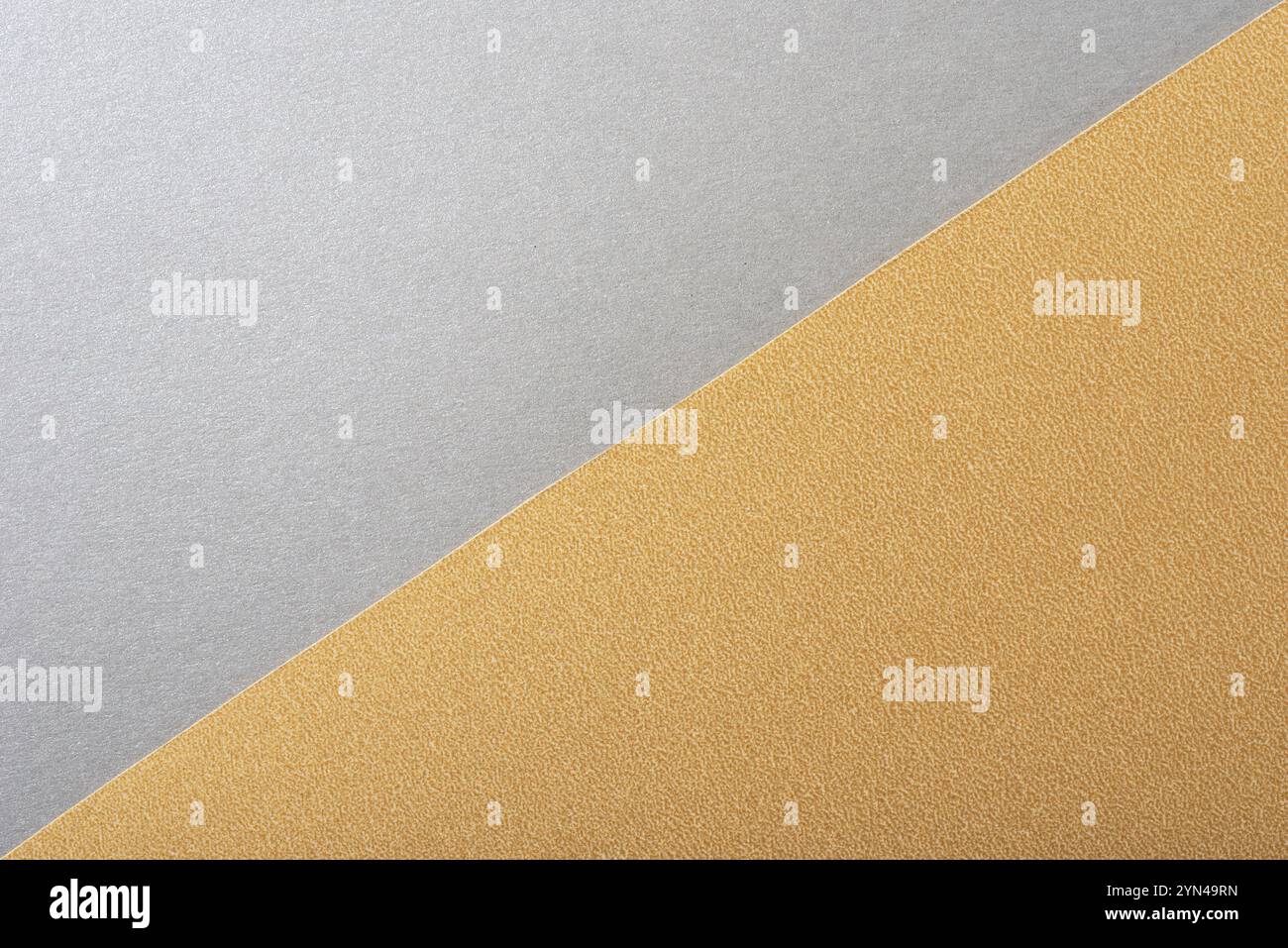 Minimalist abstract background with gold and gray diagonal surfaces ...