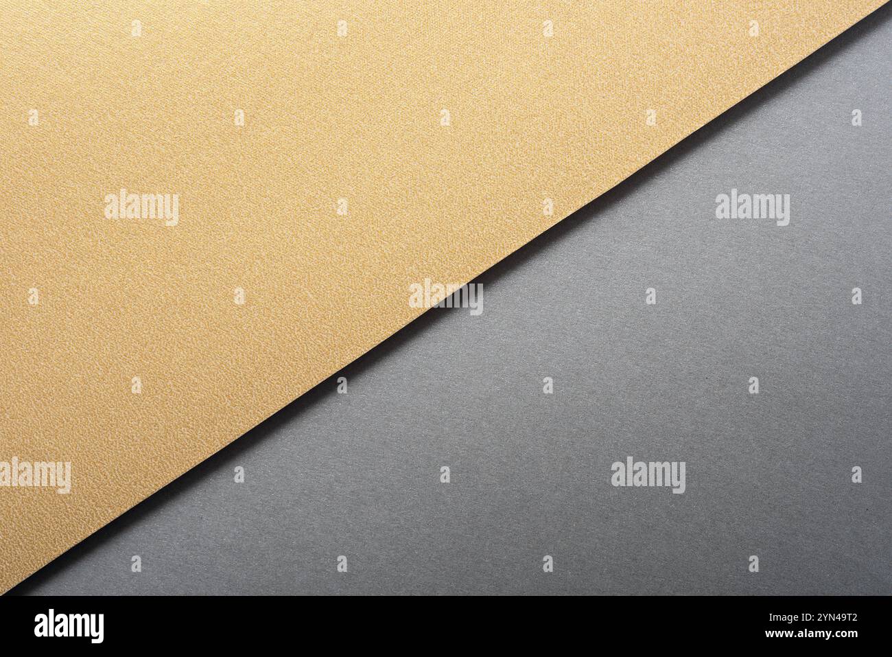 Minimalist abstract background with gold and gray diagonal surfaces ...