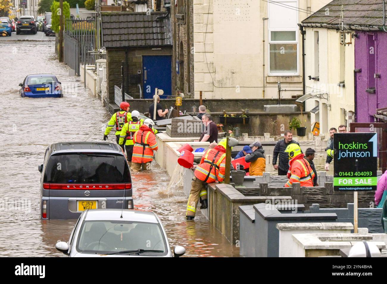 Pontypridd, Wales, UK - 24 November 2024: Flooding in a street after ...