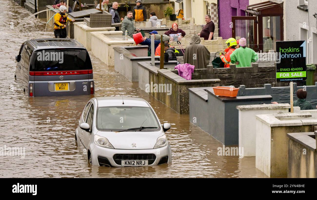 Pontypridd, Wales, UK - 24 November 2024: Flooding in a street after ...