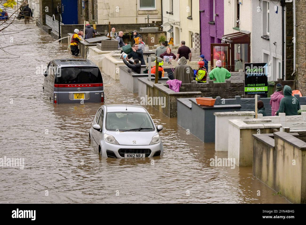 Pontypridd, Wales, UK - 24 November 2024: Flooding in a street after ...