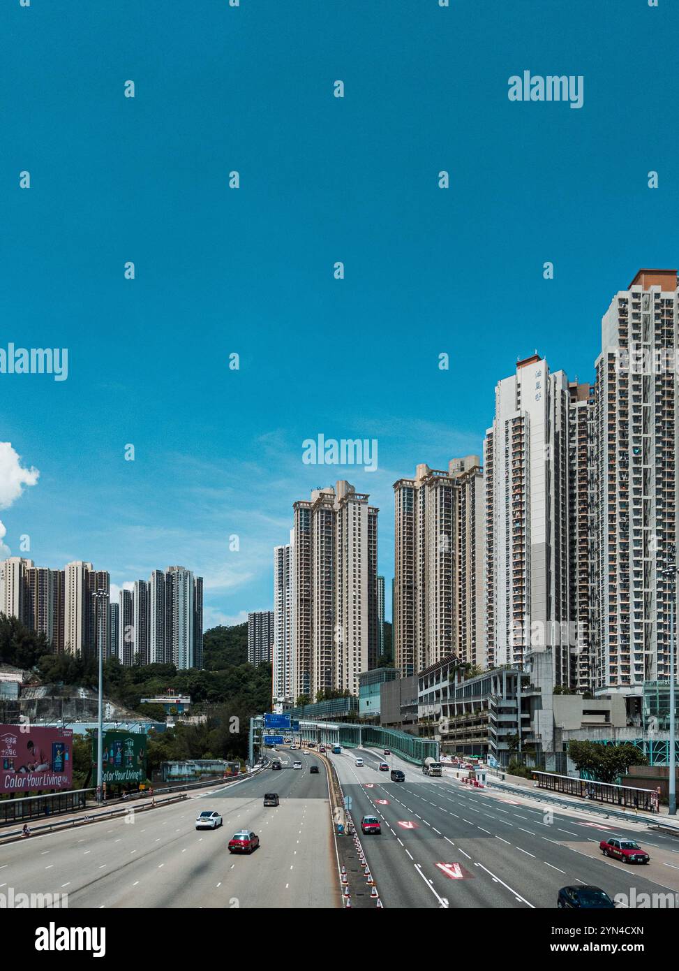 "Urban Cityscape with Skyscrapers and Highway Under Bright Blue Sky in ...