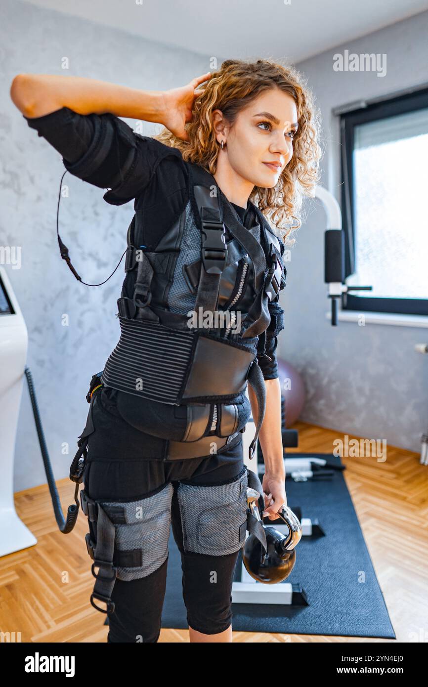 Using advanced fitness tech in EMS training Stock Photo - Alamy
