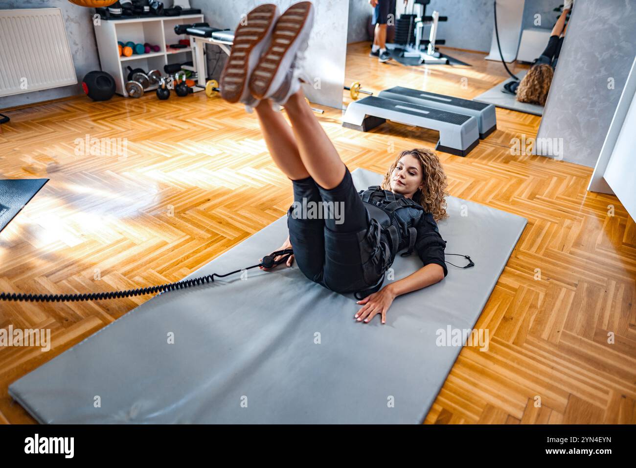 Get full-body fitness with at-home e-stimulation Stock Photo - Alamy
