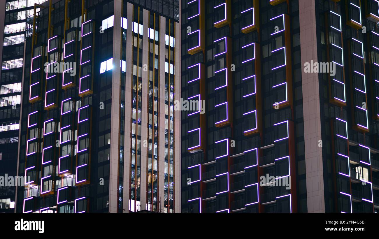 Night architecture, skyscrapers with glass facade. Modern buildings in ...