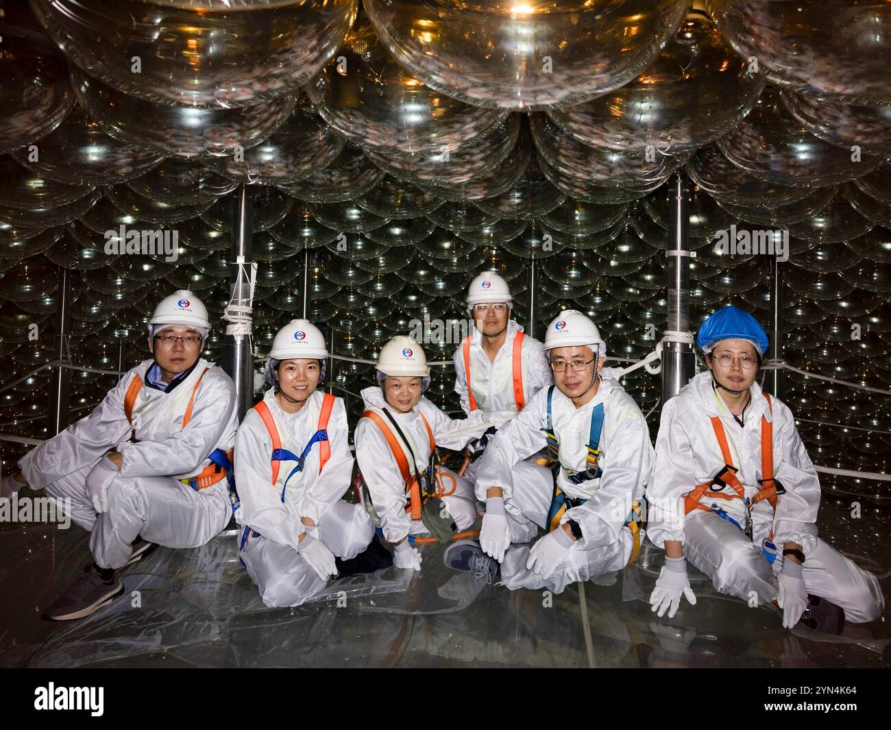 Jiangmen, China's Guangdong Province. 23rd Nov, 2024. Staff members pose for a group photo at ...