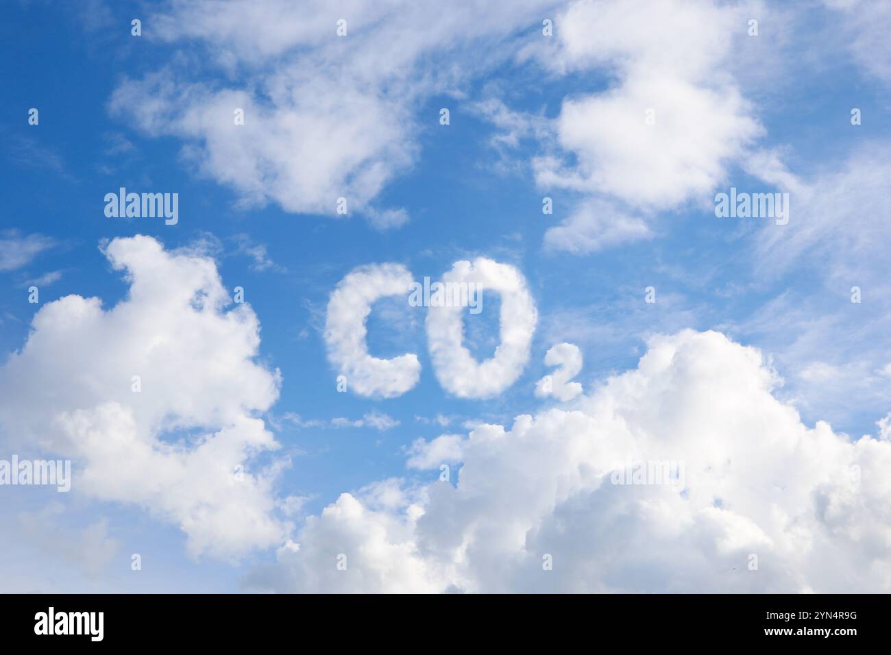 A blue sky with the chemical formula CO2 from white clouds. The concept ...