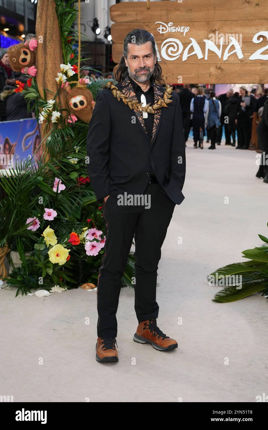 Director David Derrick Jnr poses for photographers upon arrival at the ...