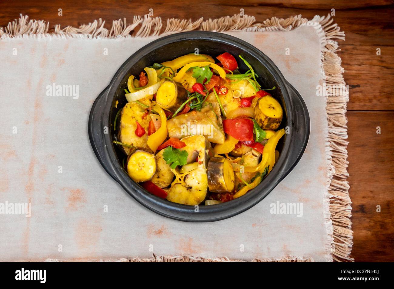Typical Brazilian tropical fish stew with palm oil, coconut milk and ...