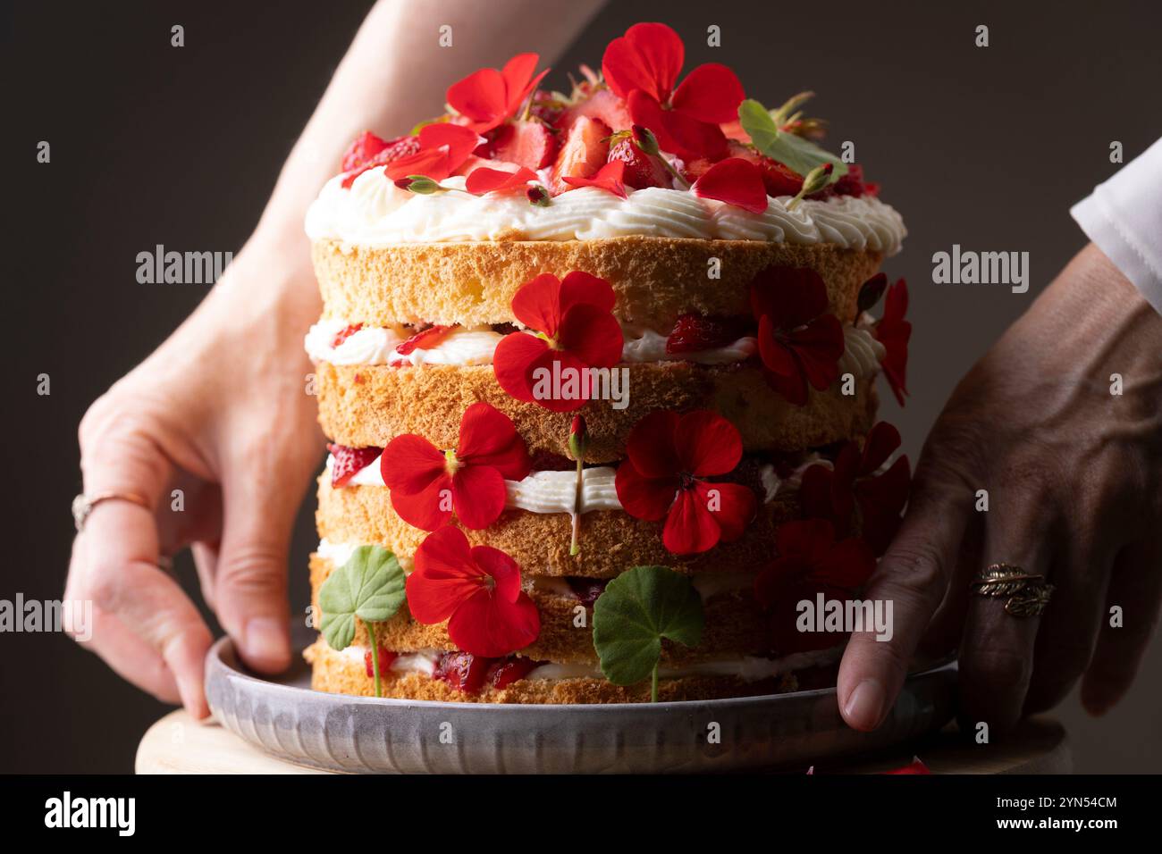 beautiful biscuit cake with strawberries decorated with natural ...