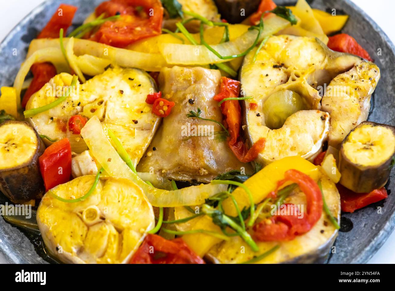 Typical Brazilian tropical fish stew with palm oil, coconut milk and ...