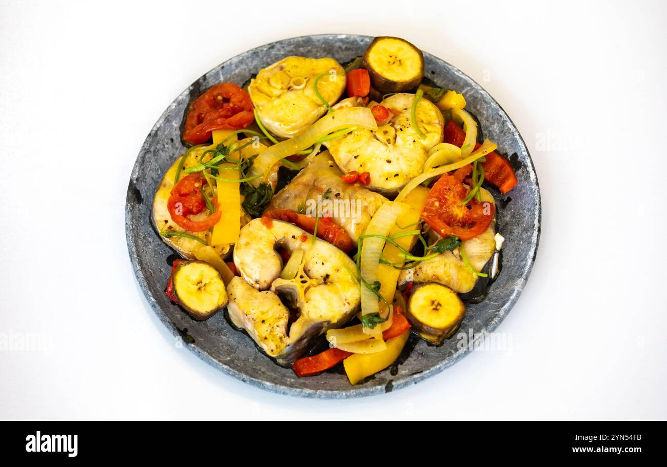 Typical Brazilian tropical fish stew with palm oil, coconut milk and ...