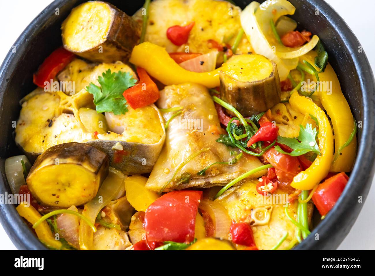 Typical Brazilian tropical fish stew with palm oil, coconut milk and ...