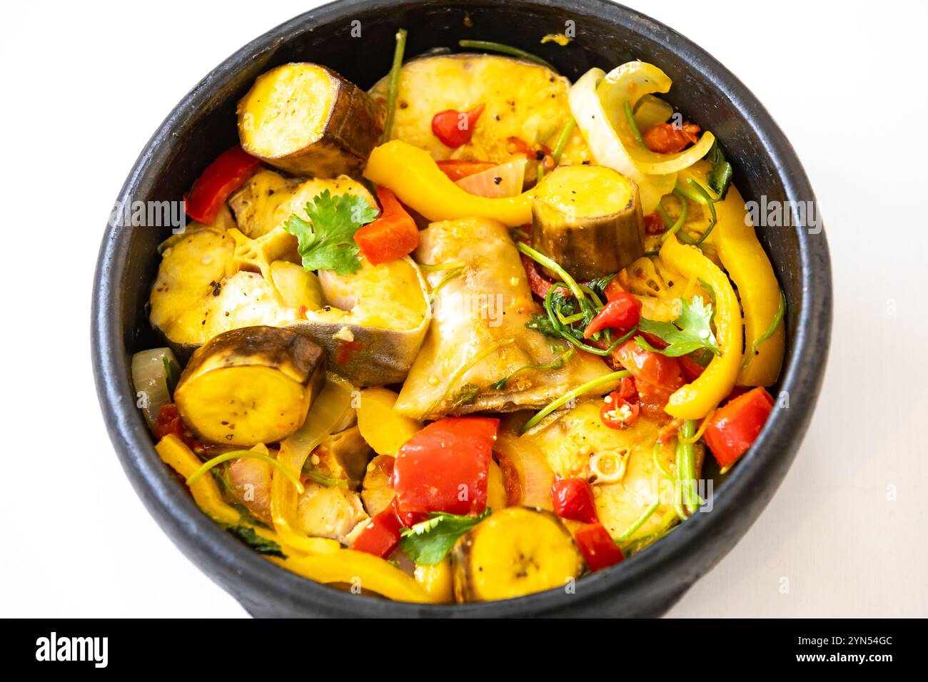 Typical Brazilian tropical fish stew with palm oil, coconut milk and ...