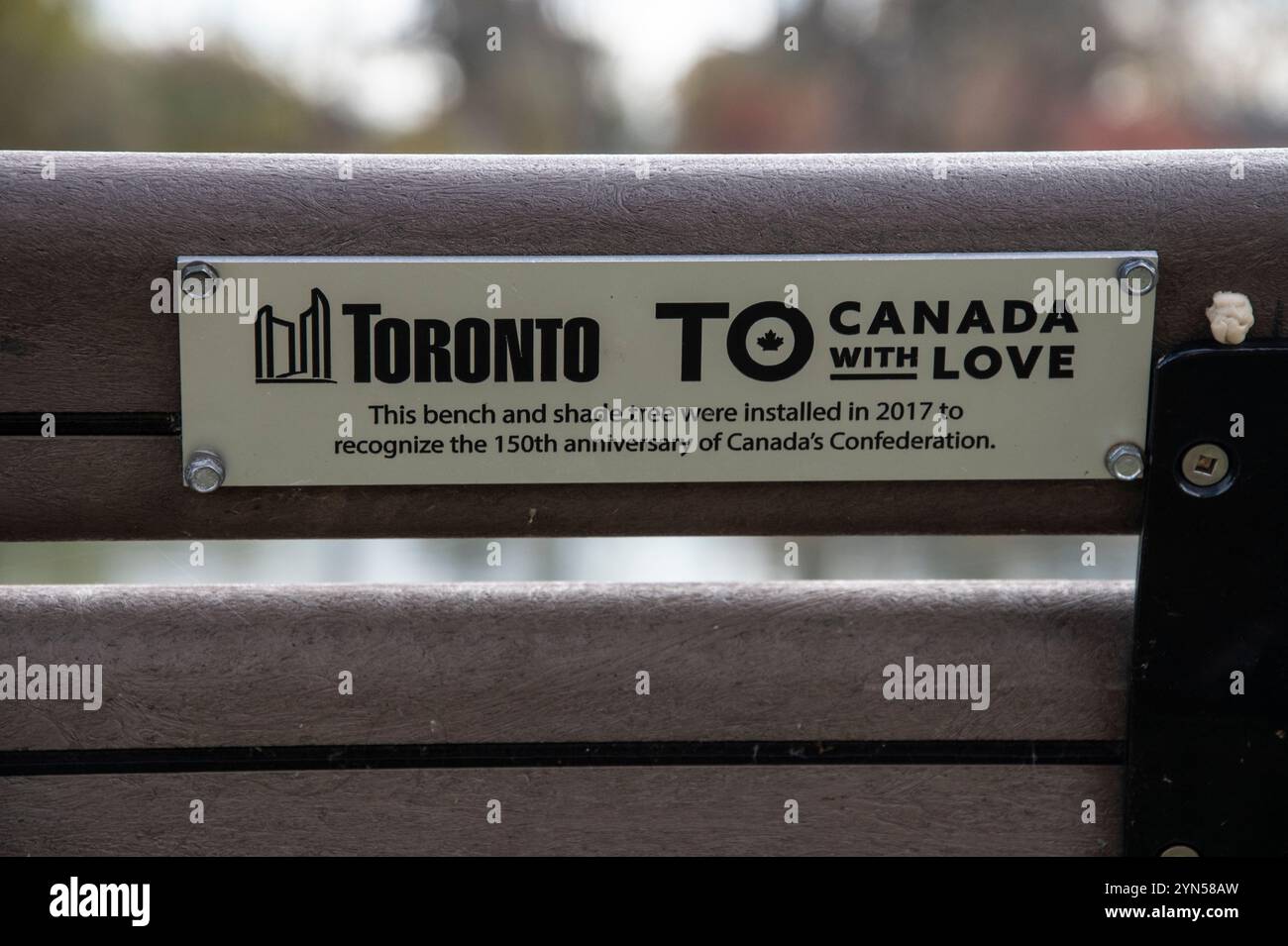 Canada confederation 150 anniversary sign on a bench at Bluffer's Park ...