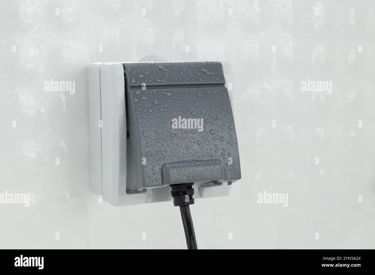 Waterproof Outdoor Electrical Socket with Water Droplets Stock Photo ...
