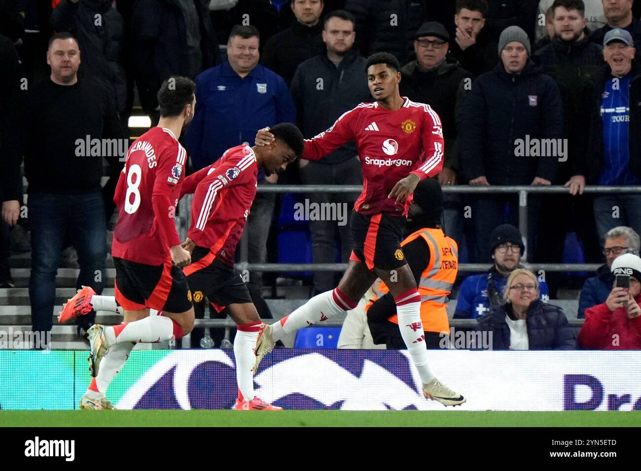 Manchester United's Marcus Rashford (right) celebrates scoring their ...